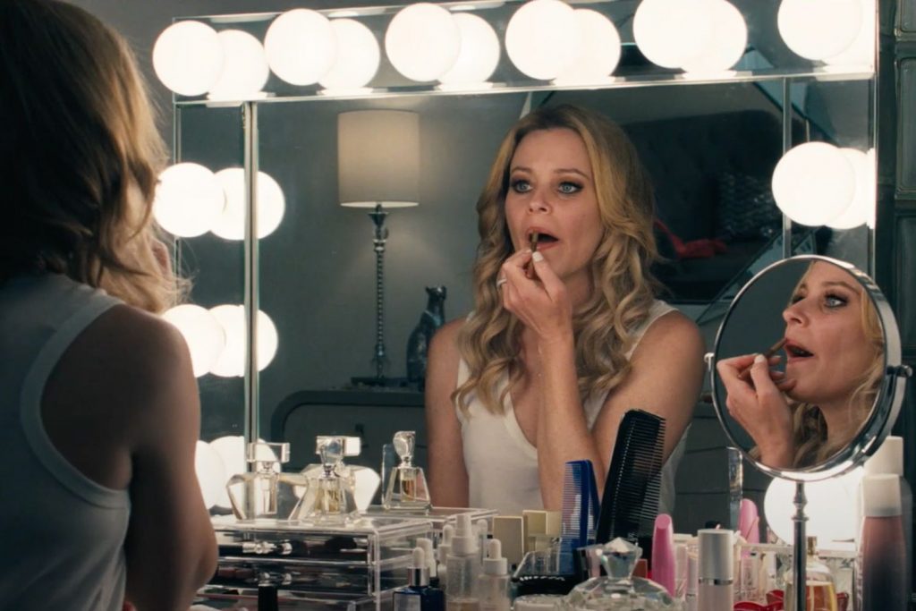 Elizabeth Banks searches for the person ruining her life in the ...